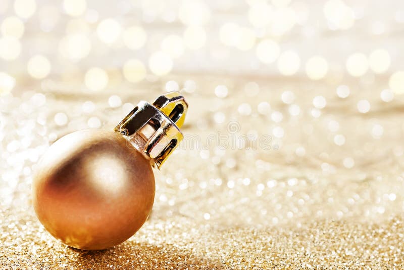 Gold Decorative Ball on Bokeh Shiny Background. Stock Image - Image of ...