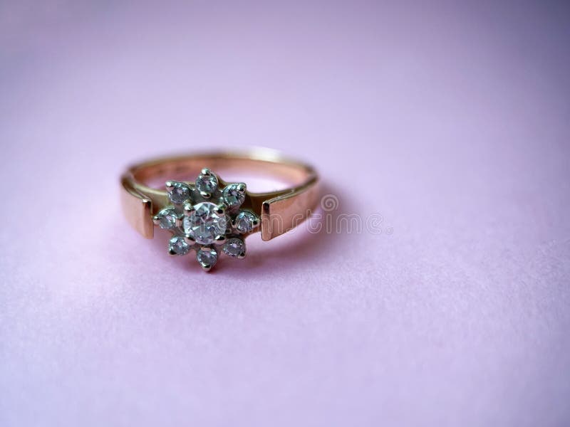 Gold Diamond Ring on Pink Isolated Background. Red Gold Ring Stock ...