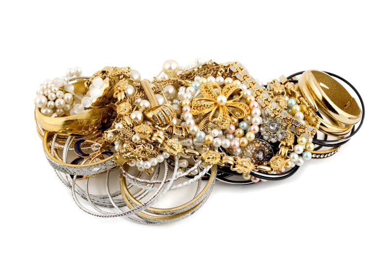 Hand holding gold jewelry stock photo. Image of necklaces - 18240882