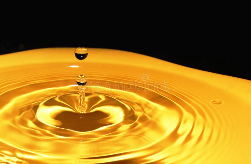 Gold Drop of Water on a Black Background-2 Stock Photo - Image of gold ...