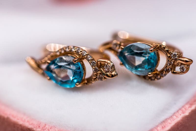 Gold Earrings in the Gift Box. Stock Image - Image of golden ...