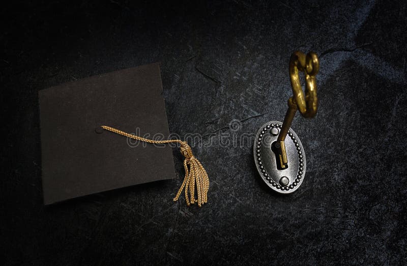 Gold education key and cap stock image. Image of graduate - 211948531
