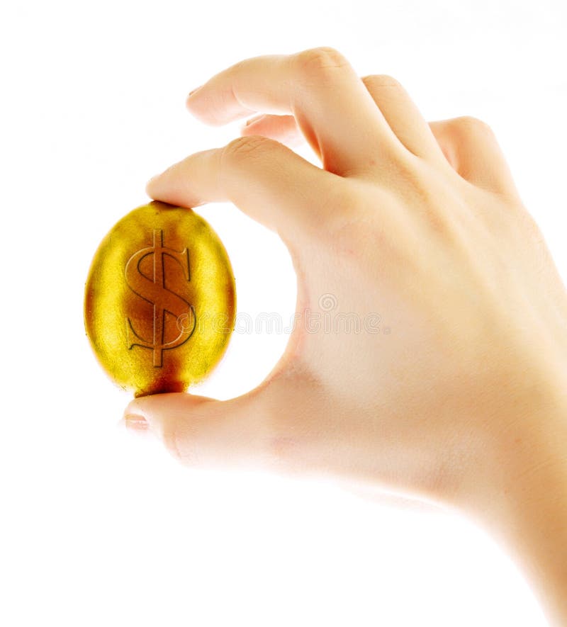 Gold Egg with Dollar Sign in Hand Isolated Stock Photo - Image of ...
