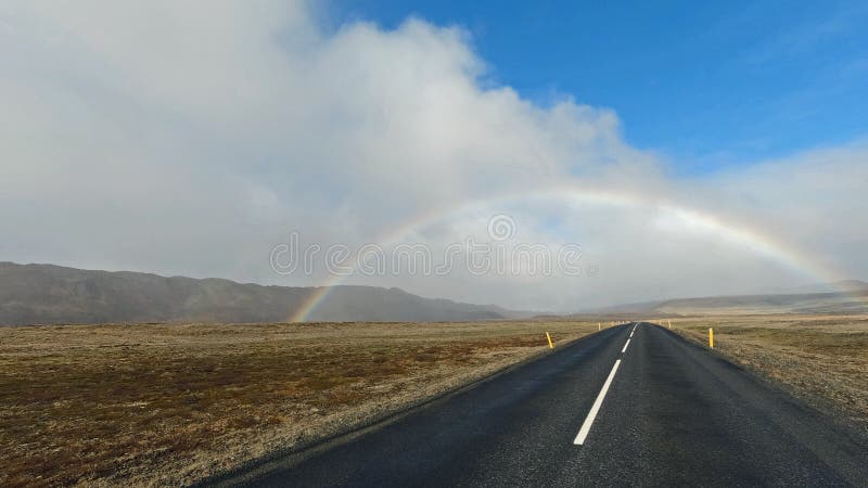 Rainbow Across the Road in Iceland Stock Image - Image of beautiful ...