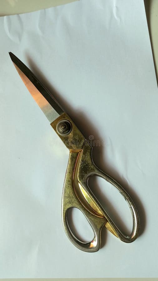 Gold Fabric Scissors for Sewing Stock Photo - Image of wing, weapon ...