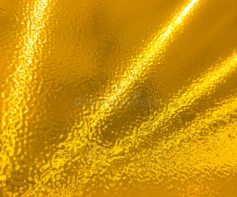 A Gold Fabric with a Shiny, Reflective Surface Stock Image - Image of ...