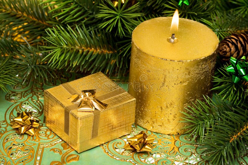 Gold festive candle stock image. Image of natal, december - 10037437