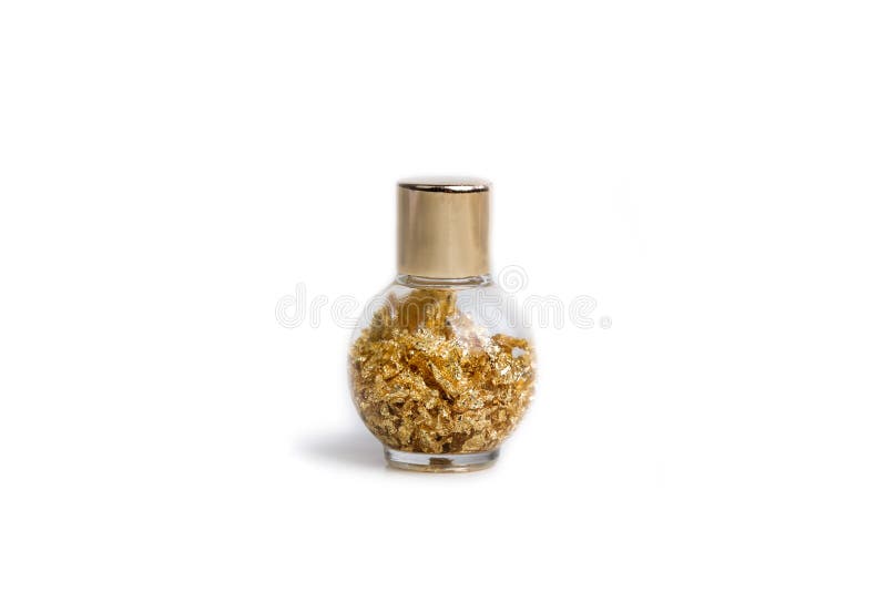Gold Flake Filled Round Glass Bottle with Small Gold Colored Top Stock ...