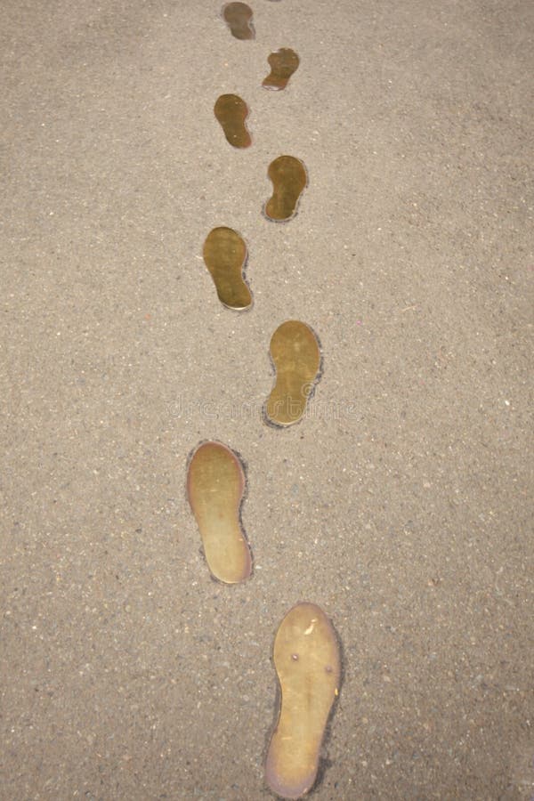 Gold footprints stock image. Image of background, wallpaper - 5136575