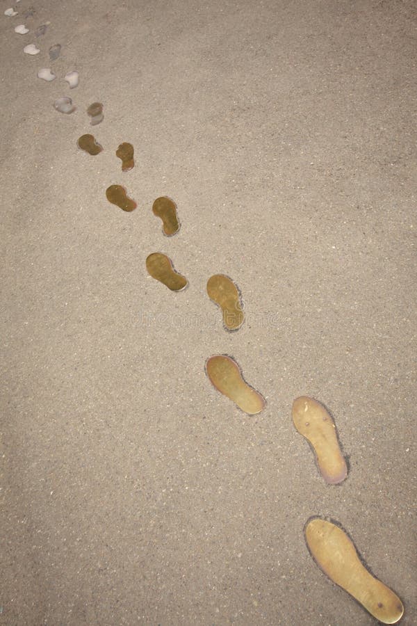 Gold footprints stock image. Image of background, wallpaper - 5136575