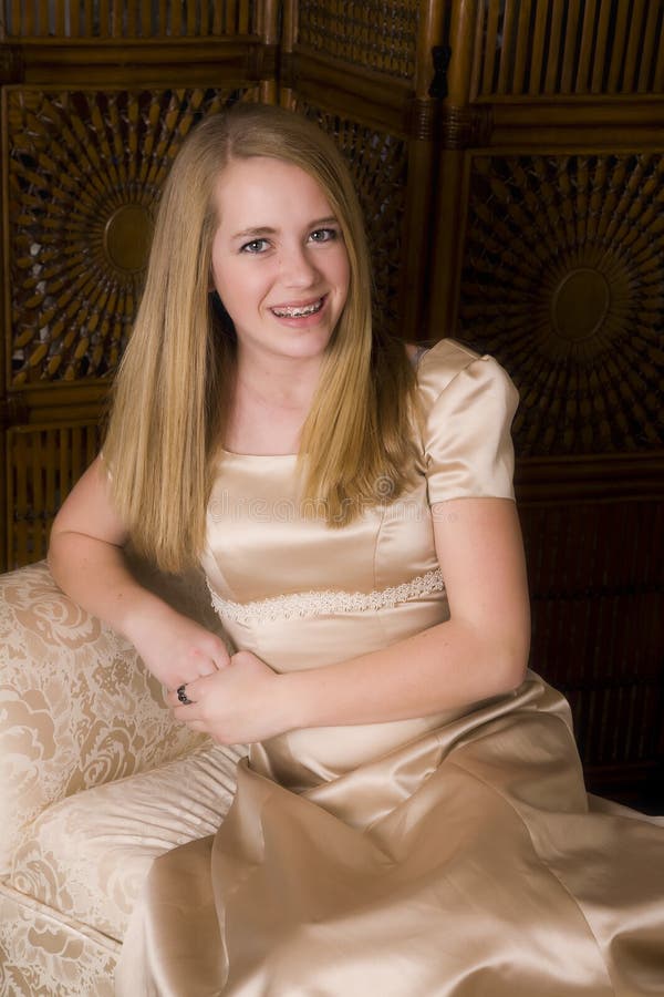 Gold formal sitting stock photo. Image of graceful, lady - 12256238