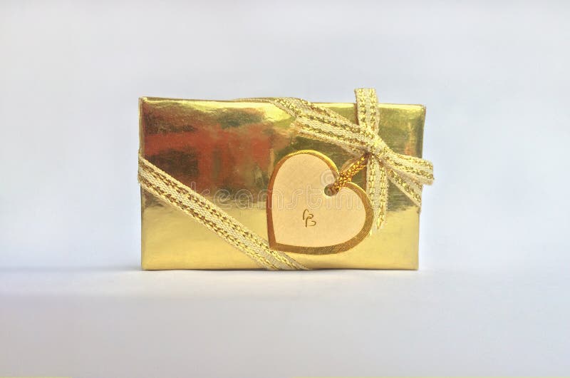 Gold Gift Box with Heart Label Card Stock Image - Image of glitter ...