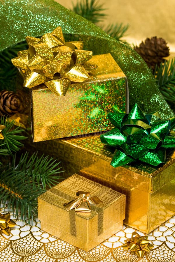 Gold gift boxes stock photo. Image of branch, evergreen - 10037480