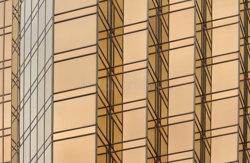 Gold glass building facade stock image. Image of reflection - 128930629