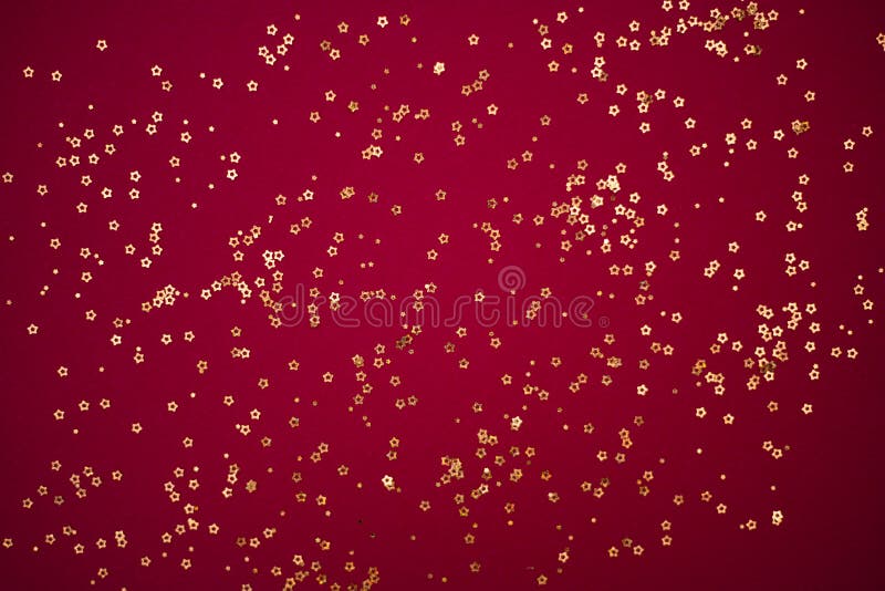 Gold Glitter Stars on a Dark Red Background Stock Image - Image of ...