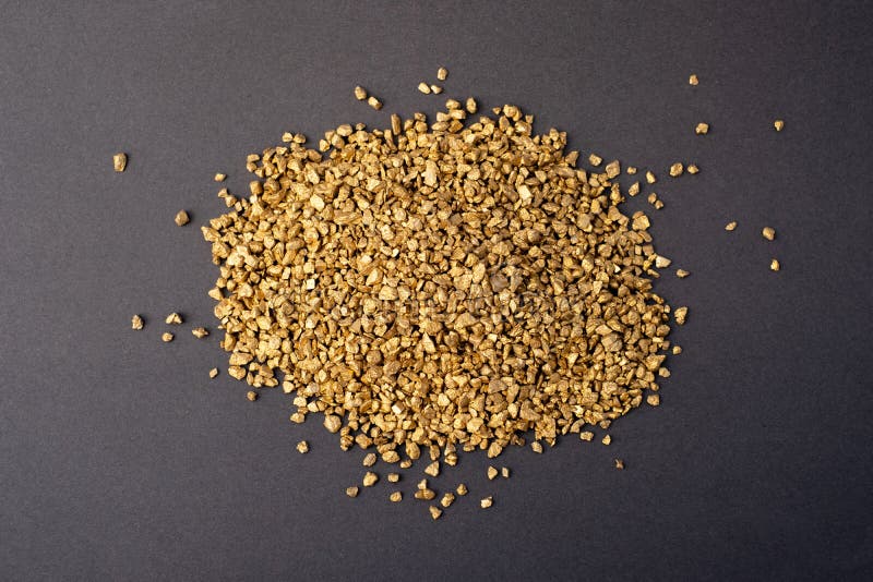 Gold Granules on Gray Background Stock Image - Image of alloy ...