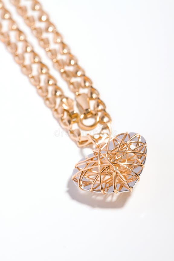 Gold heart and chain stock image. Image of white, shape - 7718543