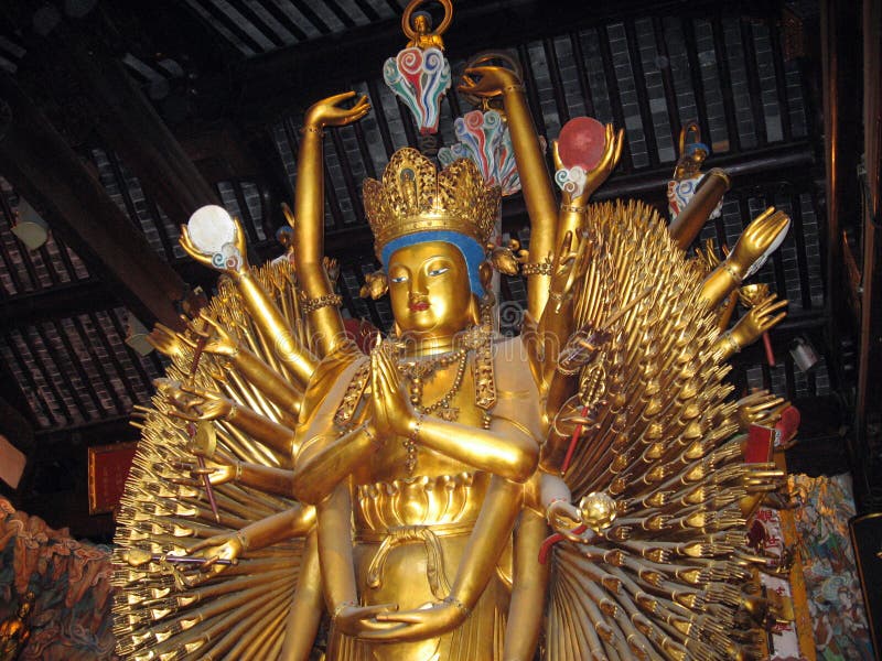 Gold Hindu Goddess Statue with Multiple Arms Stock Photo - Image of ...