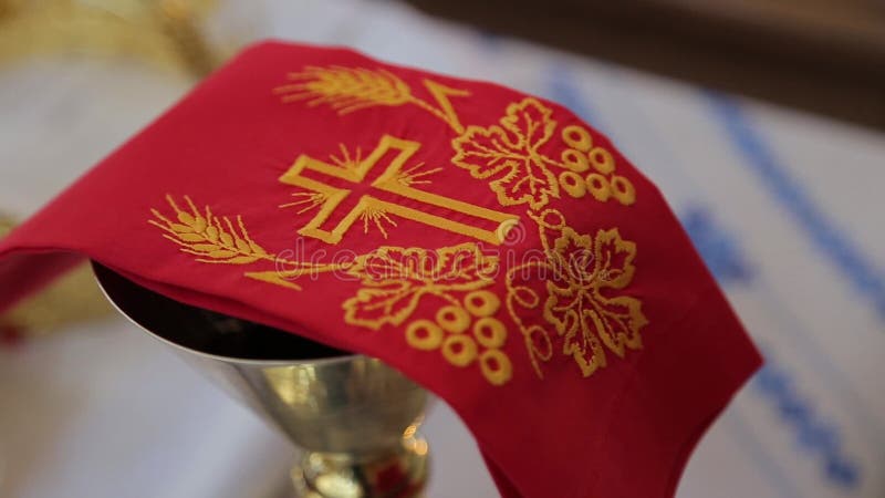 Golden Chalice with Glowing Cross and White Doves in Flight ...