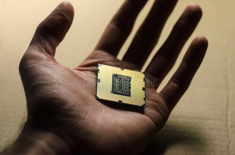 Intel CPU On Hand,Pentium 4 Stock Image - Image of core, macro: 66670301