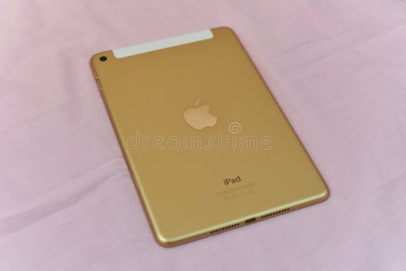 Gold ipad editorial stock image. Image of ipad3, hand - 68772474