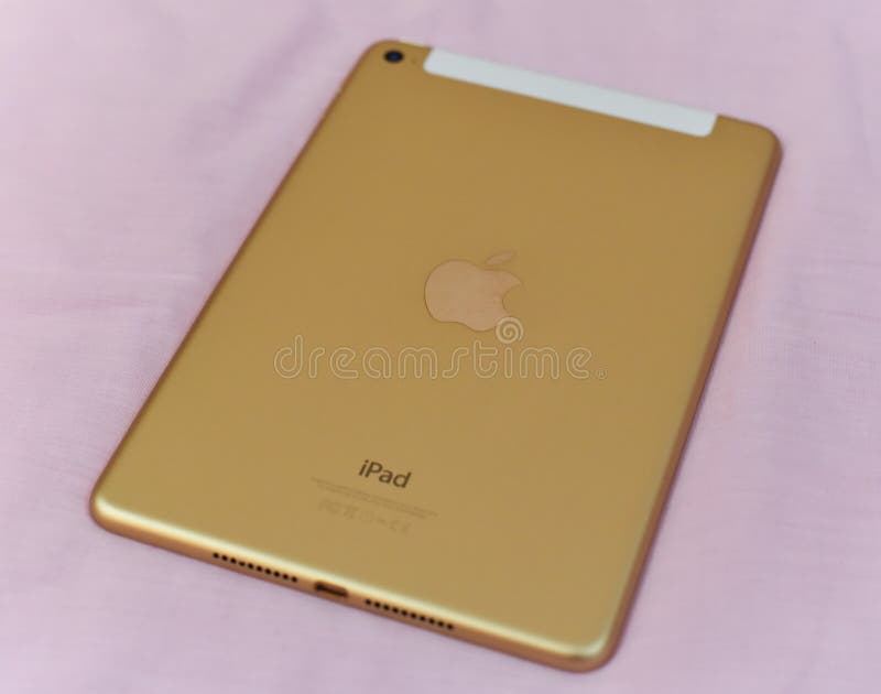 Gold ipad editorial image. Image of ebook, computer, modern - 68772500