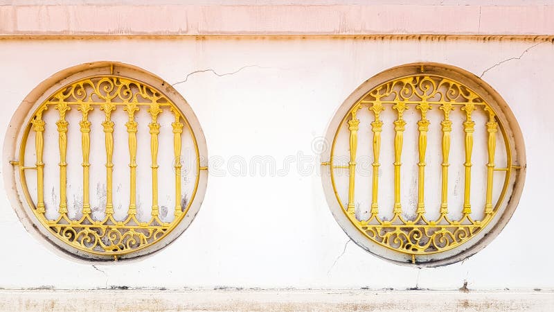 Gold Iron Bar with Circle Windows on the Broken White Wall Stock Photo ...