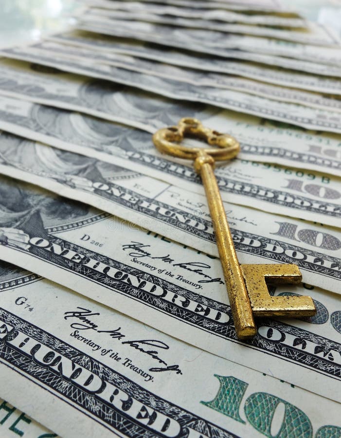Gold key on cash stock photo. Image of finance, cash - 93749868