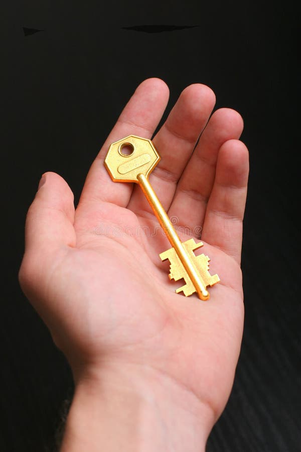 Gold key in hand stock image. Image of estate, golden - 2964797