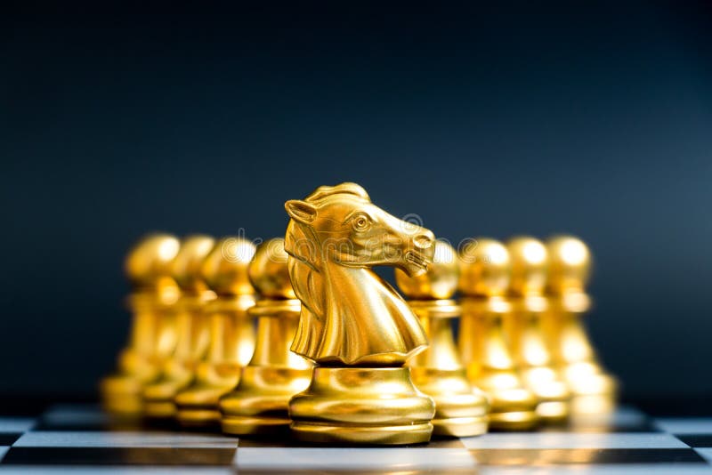 Gold Knight Chess Surrounded by a Number of Fallen Silver Chess Stock ...