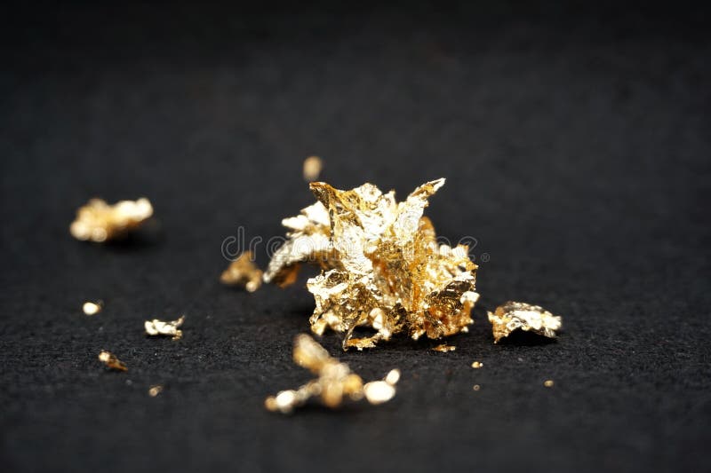 Gold Leaf Clumped on Black Background Stock Image - Image of value ...