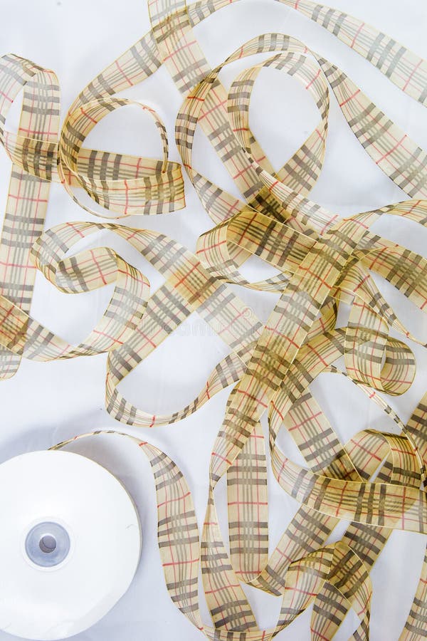 Gold line satin ribbons stock image. Image of work, pattern - 28739887