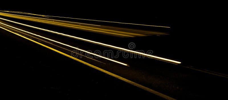 Gold Lines of Car Lights on Black Background Stock Photo - Image of ...