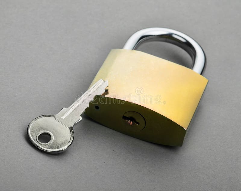 Gold lock with a key stock photo. Image of backgraund - 77972036