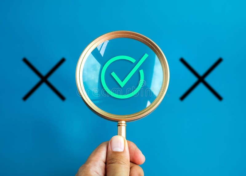 Gold Magnifier in Hand Enlarging and Focus on Green Correct or ...