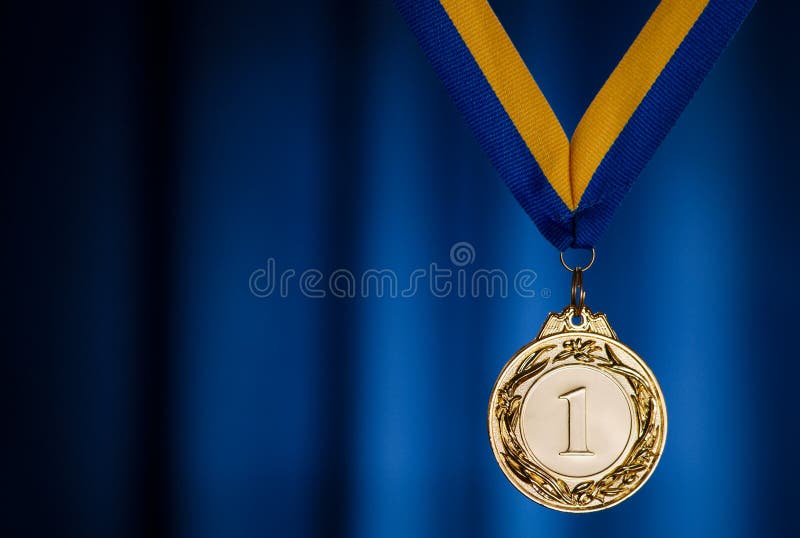 Gold Medal on a Dark Blue Background Stock Photo - Image of golden ...