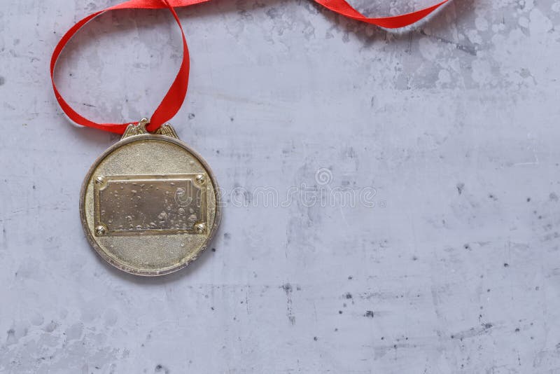 Gold medal with red ribbon stock image. Image of medals - 143400971