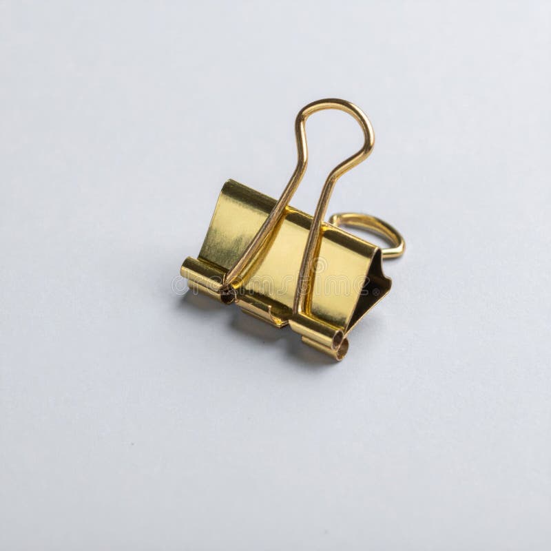 Gold Metal Binder Clip on Light Gray Background Stock Illustration ...