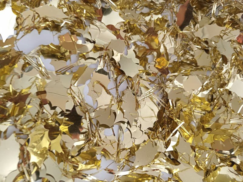 Gold Metallic Confetti Scattered on a White Background Stock ...