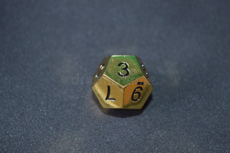 Gold Metallic D12 Twelve Sided Dice on Foam Surface Stock Photo - Image ...