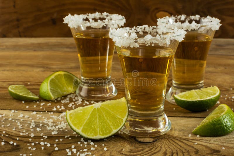 Gold Mexican Tequila with Lime and Salt Close Up Stock Image - Image of ...