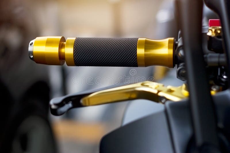 Gold Motorcycle Handle on Street Background Stock Image - Image of ...