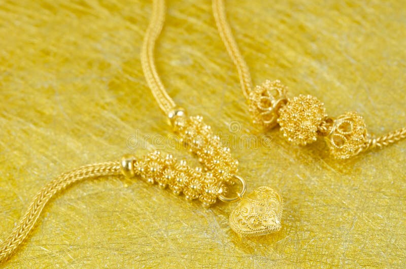 The Gold Necklace on Gold Color Background Stock Image - Image of ...