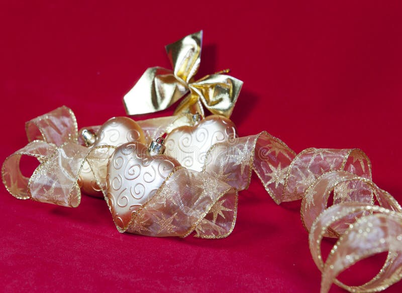 Gold New Year S Hearts and Decorative Ribbon Stock Photo - Image of ...