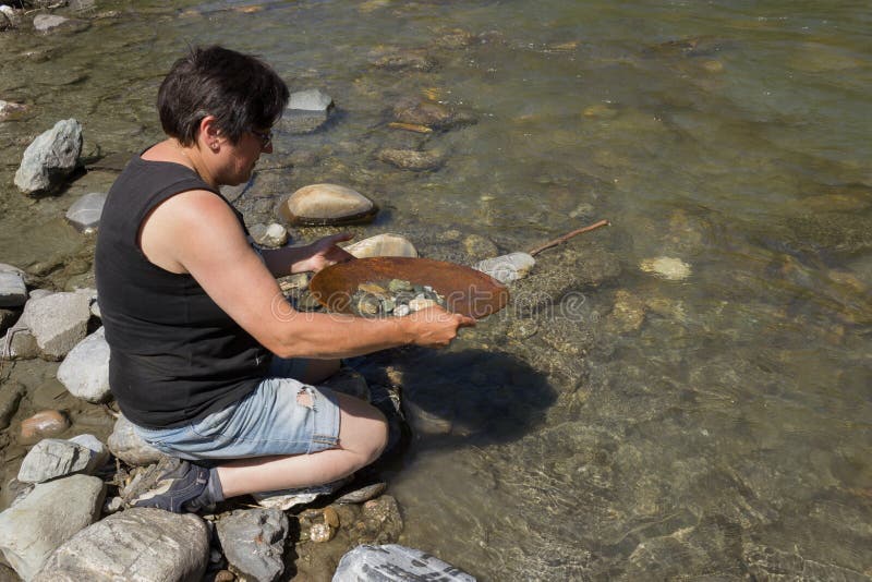 Gold Nugget Mining from the River Stock Photo - Image of klondike ...