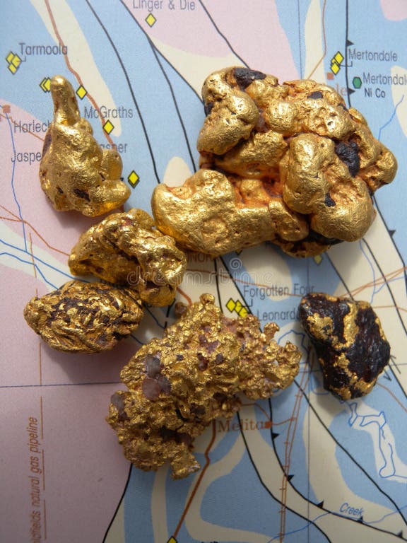 Gold nuggets stock image. Image of jewelery, prospecting - 25195661