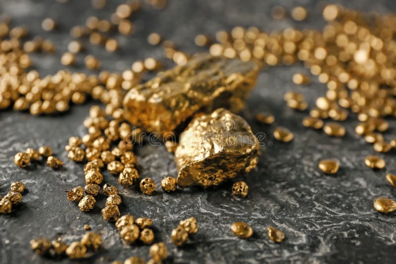 Gold Nuggets on Dark Background Stock Image - Image of nugget, color ...