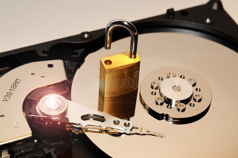 Gold Padlock On The Opened HDD Disk Drive Surface. Data Protection Or ...