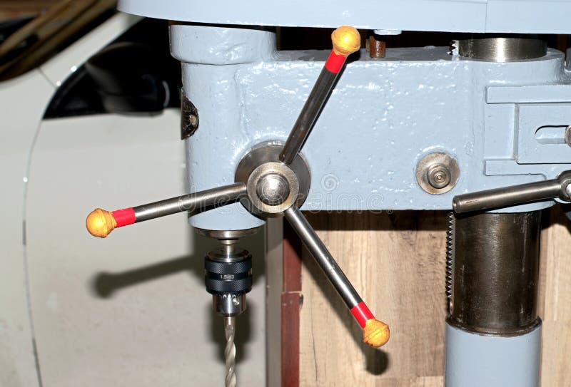 Gold-painted Handles on a Drilling Machine. Stock Image - Image of gold ...