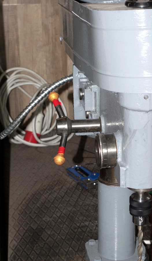 Gold-painted Handles on a Drilling Machine. Stock Image - Image of ...